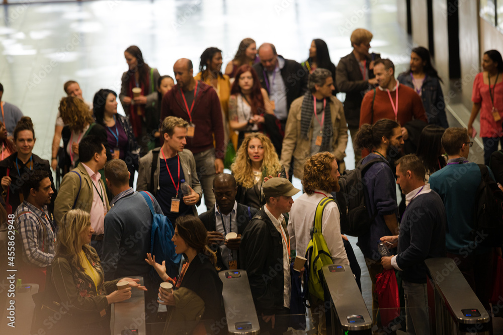 People talking during conference break Stock Photo | Adobe Stock