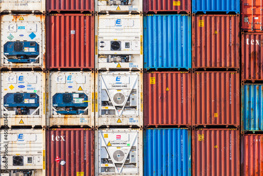 Stacked freight shipping containers Stock Photo | Adobe Stock