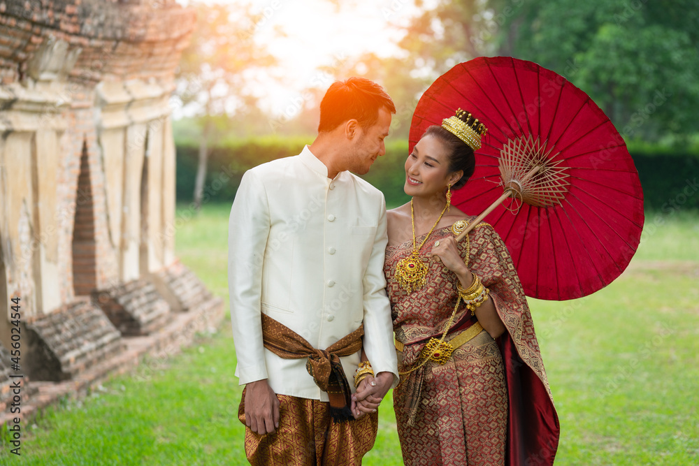 Thai couple wear Thai traditional wedding dress at ancient place ...