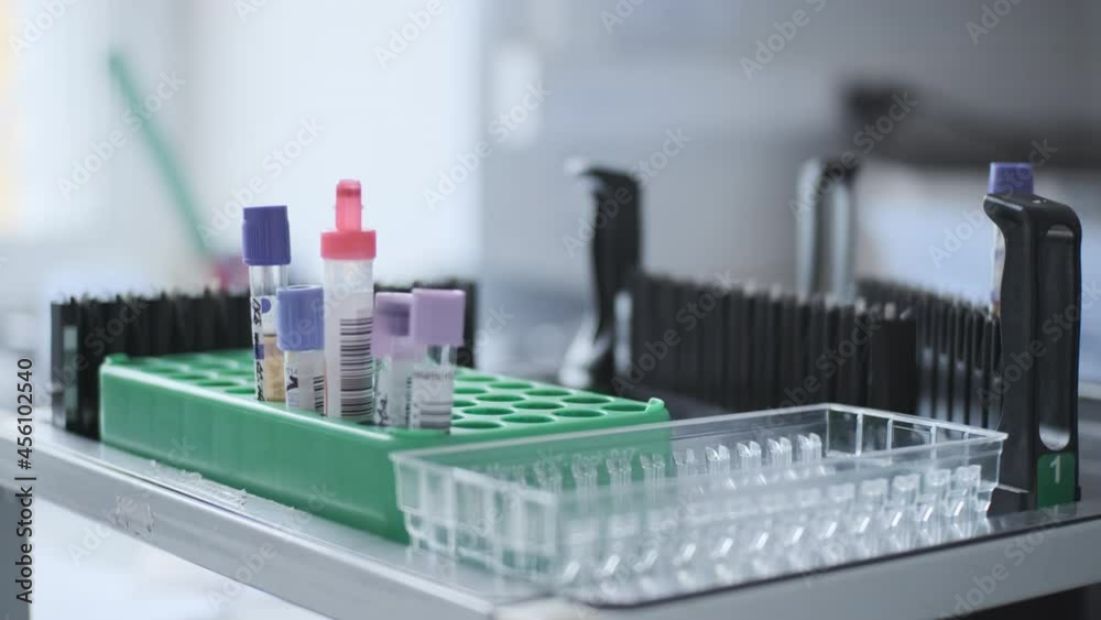 Close-up view of half-empty plastic container for blood or plasma tubes ...
