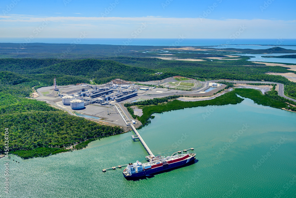 Aerial view of liquified natural gas plant and LNG ship on Curtis ...