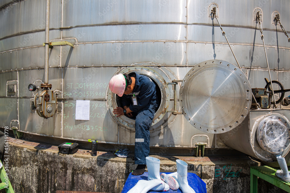 Male into the manhole tank stainless chemical area confined space Stock ...