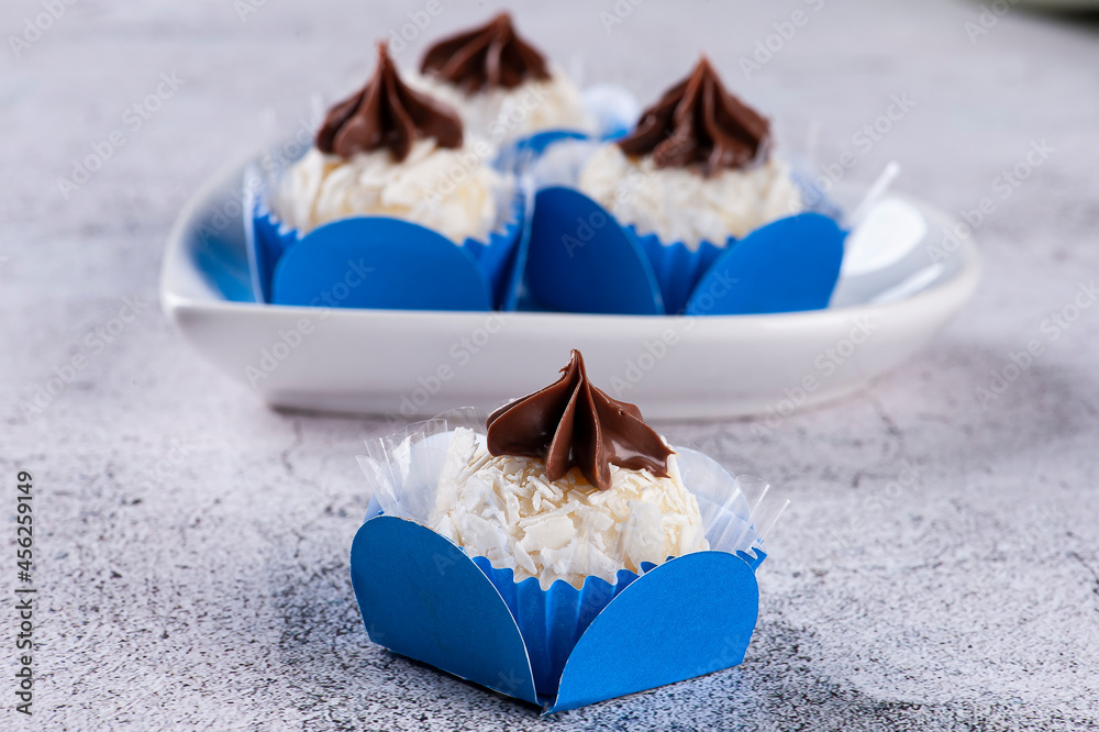 Gourmet powdered milk brigadier covered with hazelnut paste. typical ...