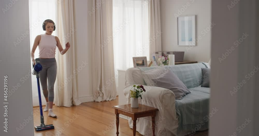 funny teenager girl dancing with vacuum cleaner doing chores cleaning ...