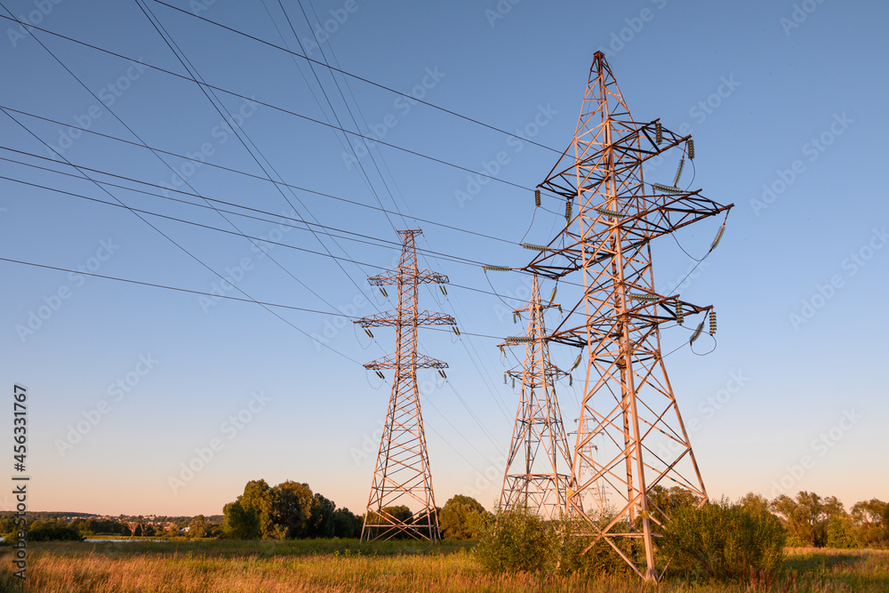 Electrical pylon and high voltage power lines. Stock Photo | Adobe Stock