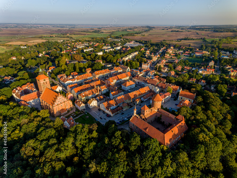 Panorama of the city of Reszel at sunrise, Castle and the Church of the ...