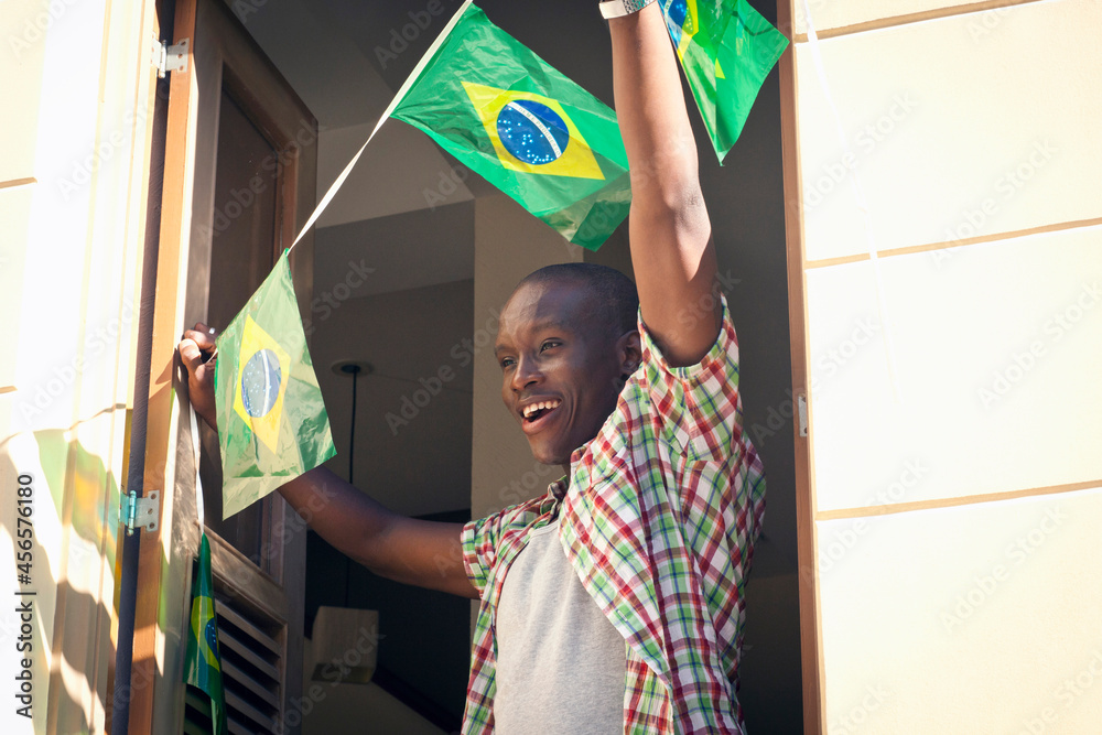 Foto de Students celebrating with Brazilian flags in the street, Rio de ...