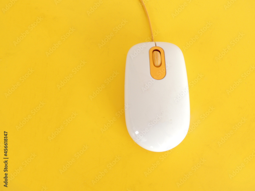 Top view of white computer mouse isolated on yellow. Stock Photo ...