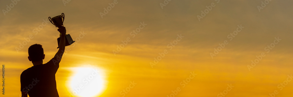 Banner Winner win hands holding golden champion trophy cup prize ...