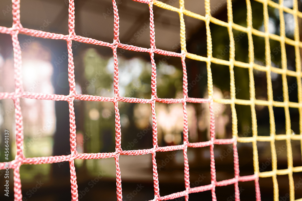 Kids playground safety net close up. Adventure part abstract blurred ...