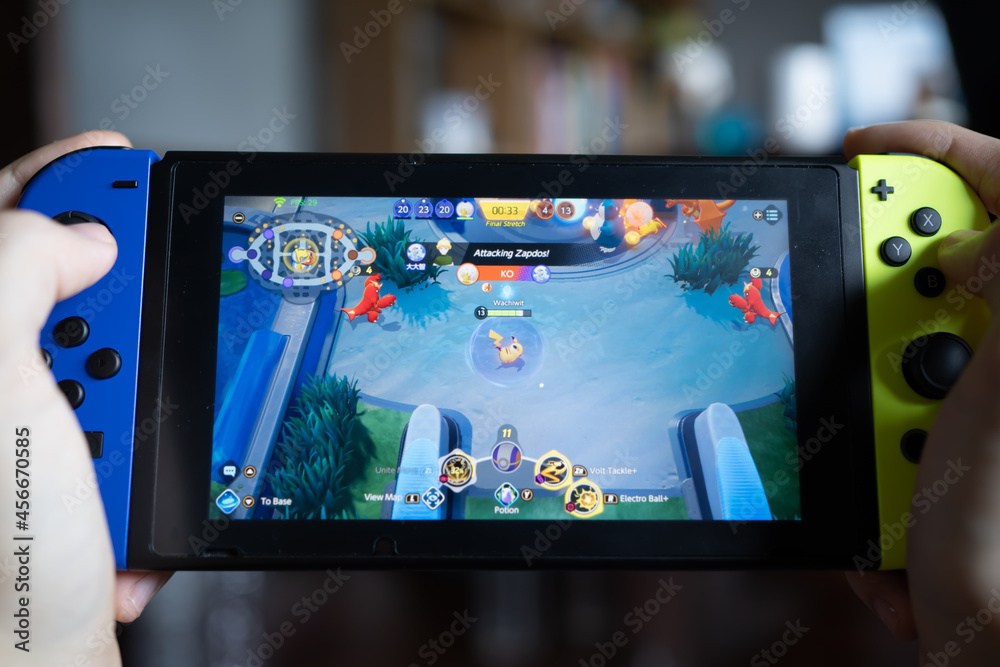 Bangkok, Thailand - August 3, 2021 : A gamer playing Pokémon Unite on ...