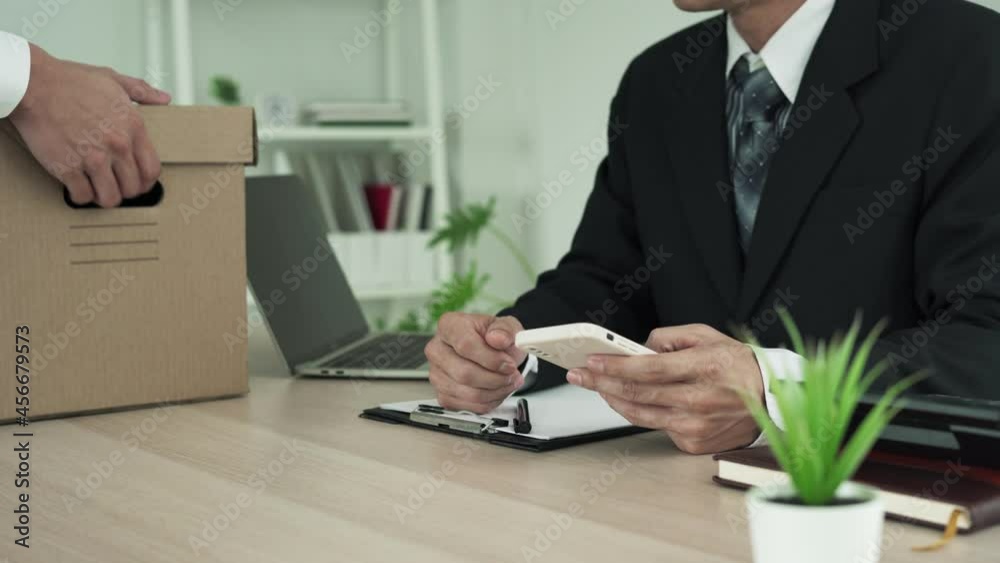 resignation and leave of work. male employee handed a resignation ...