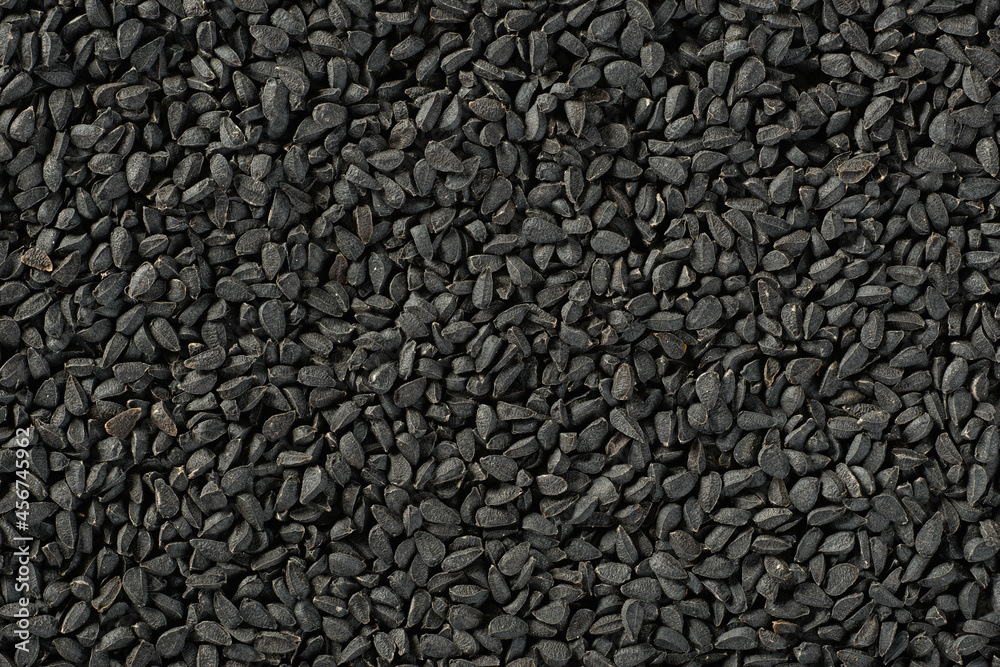 food background of kalonji seeds, top view Stock Photo | Adobe Stock