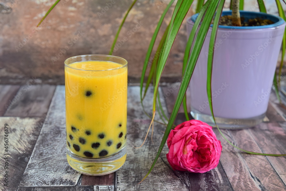 Homemade Mango bubble tea, made with mango milk and palm sugar boba ...