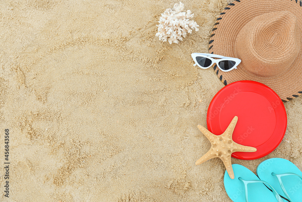 Composition with frisbee disk and beach accessories on sand Stock Photo ...