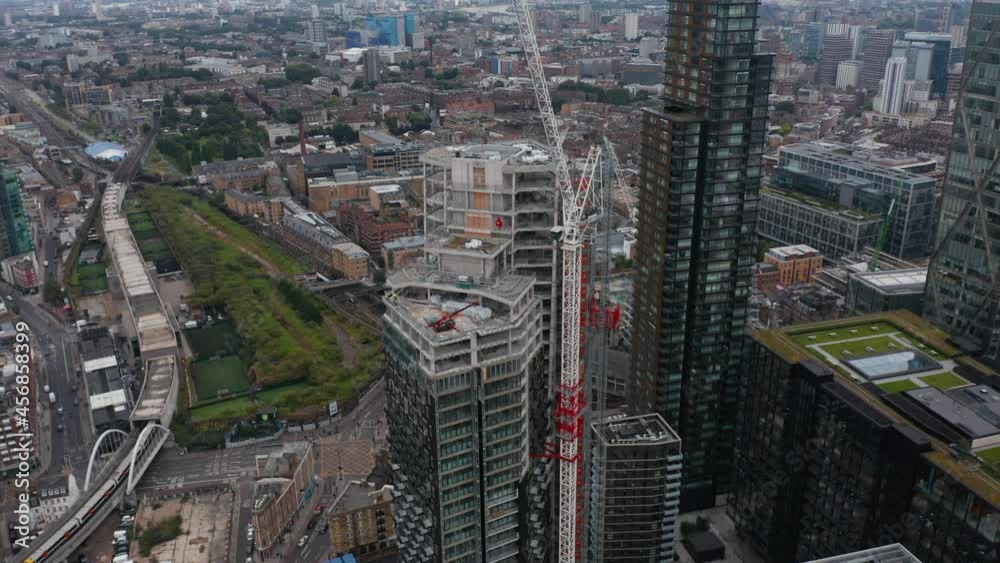 Fly around construction site of new skyscraper in Shoreditch district ...