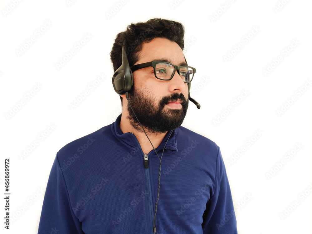 Indian Call center worker isolated on white background using headset ...