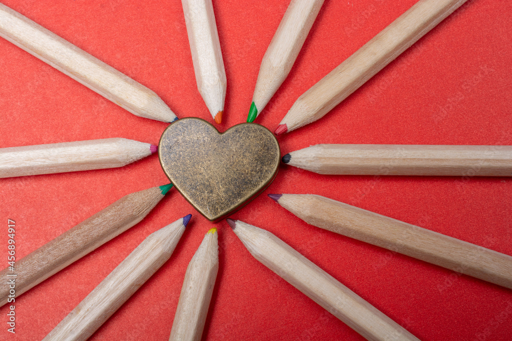 shape of heart formed by colored pencils heart icon for Valentines Day ...