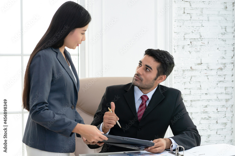 Secretary Asian woman brought for signature documents for signature to ...