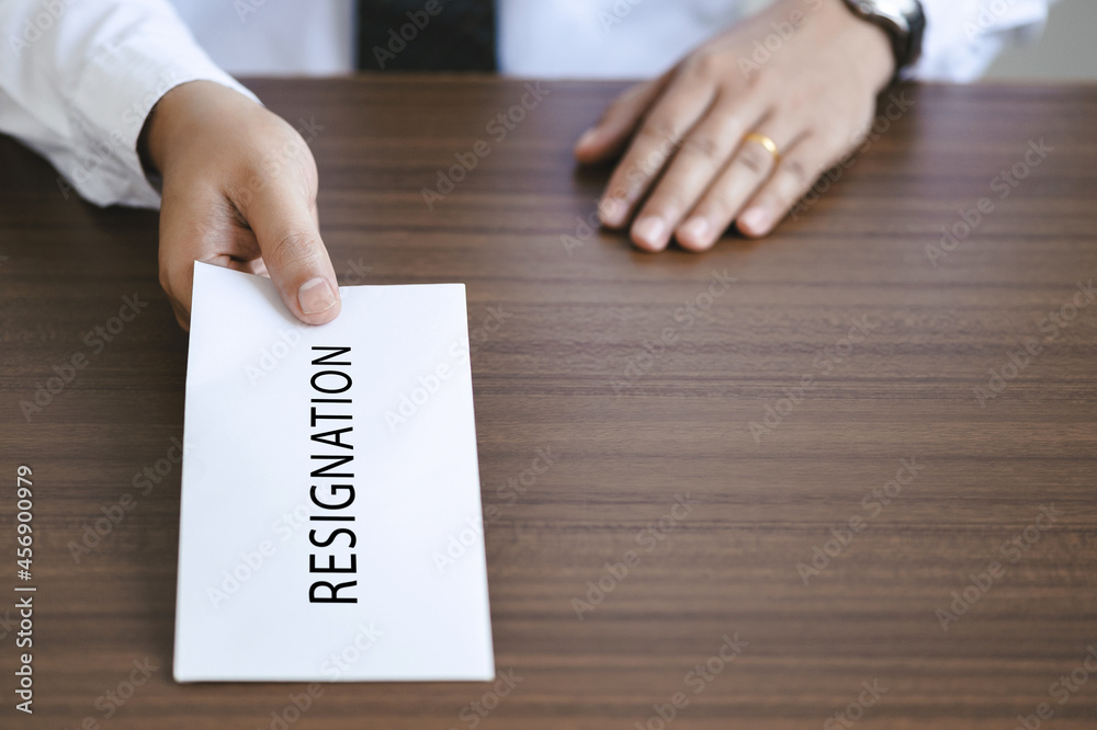 Businessman sending a resignation letter to the boss for resign by the ...