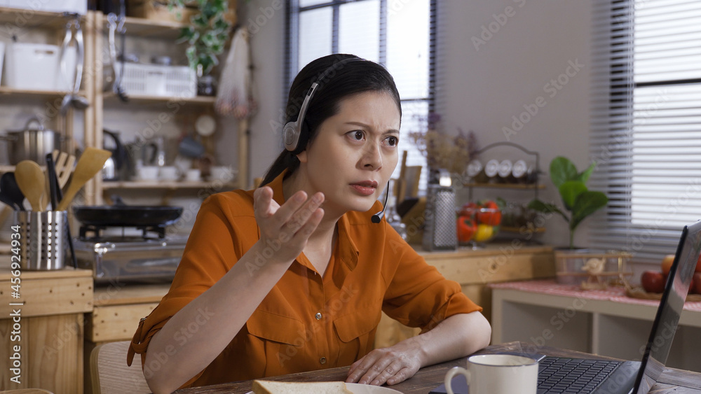 furious woman manager in headset talking on phone conversation from ...