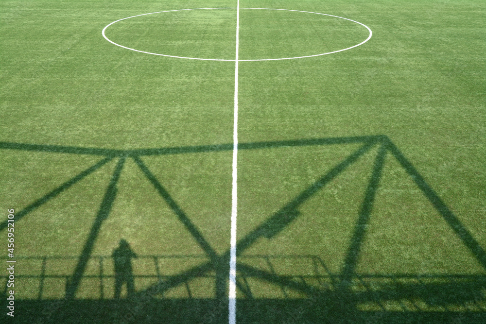 The geometric shapes drawn by the white lines of a football field ...