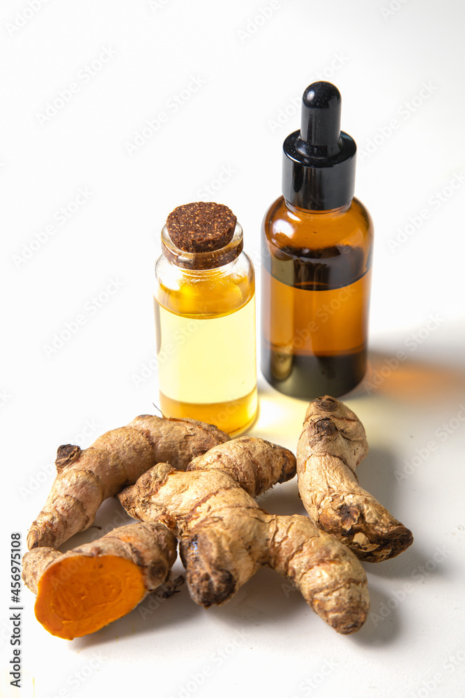 Tumeric ( curcumin, curcuma longa Linn) and bottle of turmeric ...