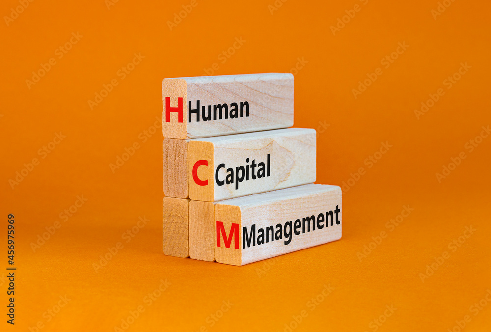 HCM, Human capital management symbol. Concept words HCM, Human capital ...