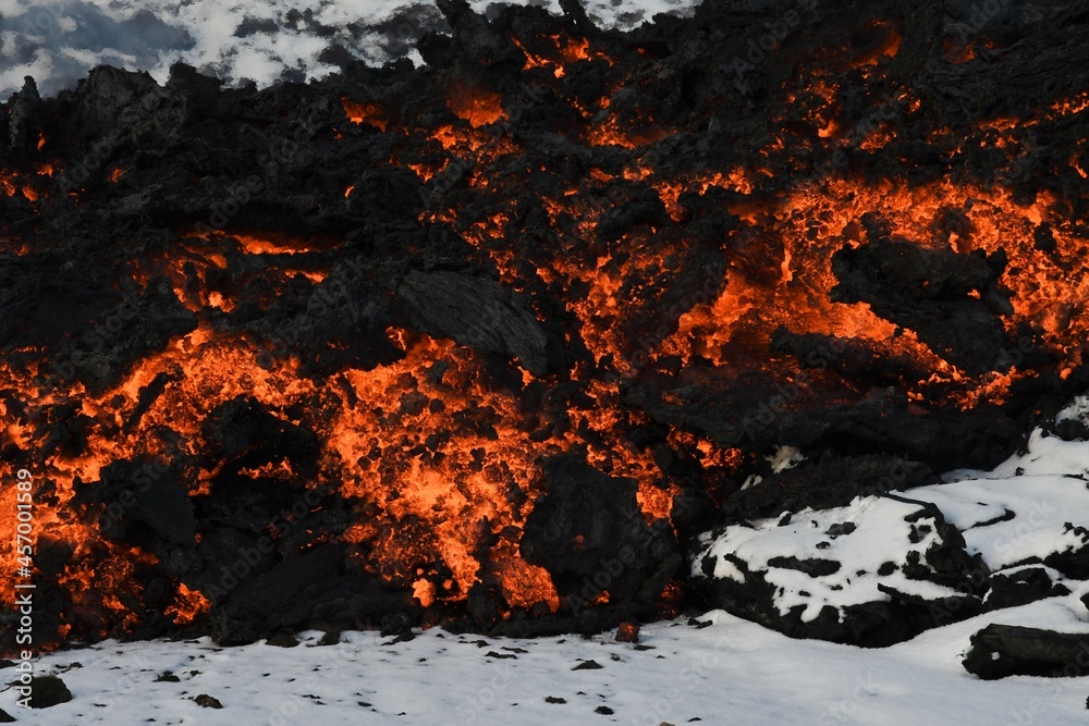 Lava flow at Fagradalsfjall, Iceland. Molten red and orange lava flows ...
