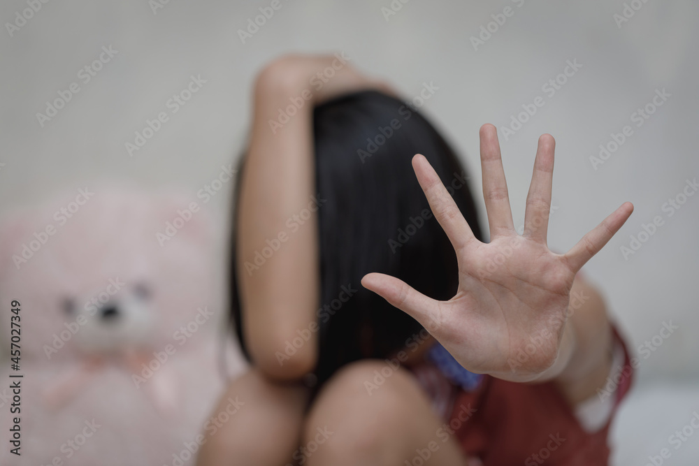 Kid girl showing hand signaling to stop useful to campaign against ...