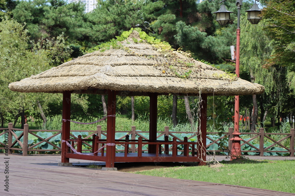 Korean traditional thatched hut at the Songdo Smart City, South Korea ...