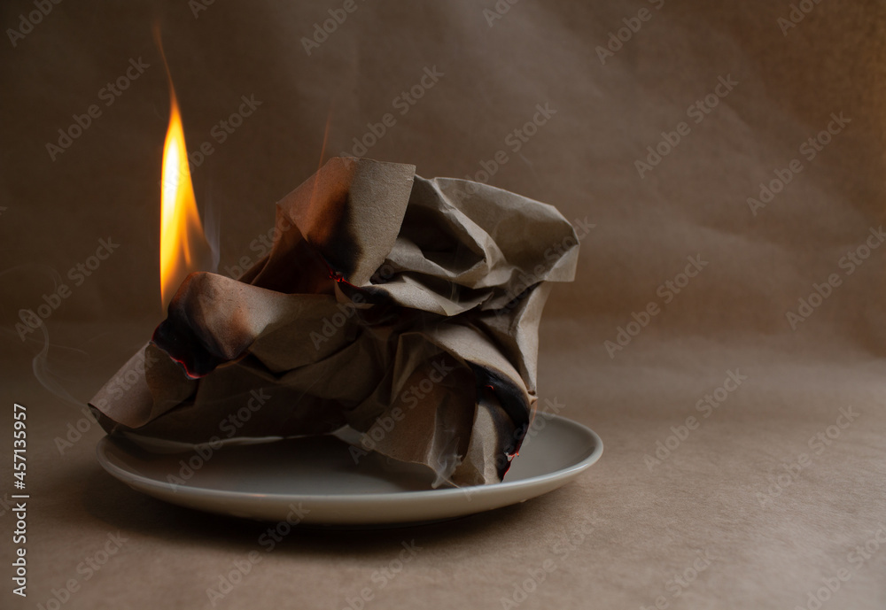 flame, burning paper, brown background Stock Photo | Adobe Stock