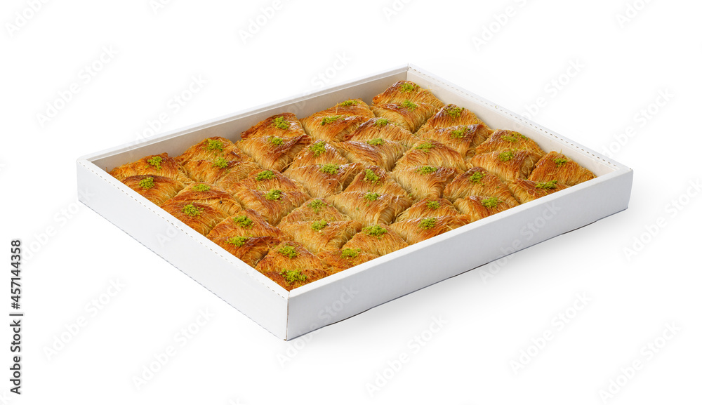 Assortment of Turkish baklava dessert in a white box isolated on white ...