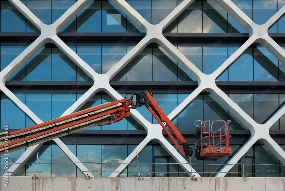 Installation of the facade system with the crane Stock Photo | Adobe Stock