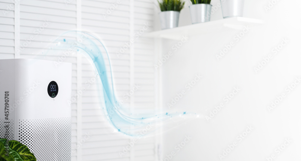 air purifier a living room, air cleaner removing fine dust in house ...