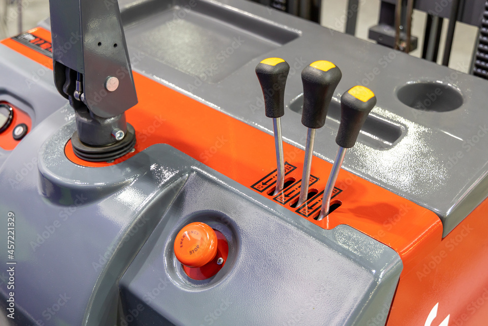 Electric forklift controls. Control console with handles and buttons ...