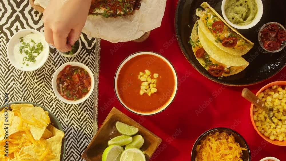 Traditional Mexican food, tex mex cuisine. Putting corn and squeezing ...