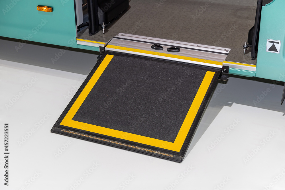 Retractable bus ramp for wheelchair and baby stroller entry. Transport ...