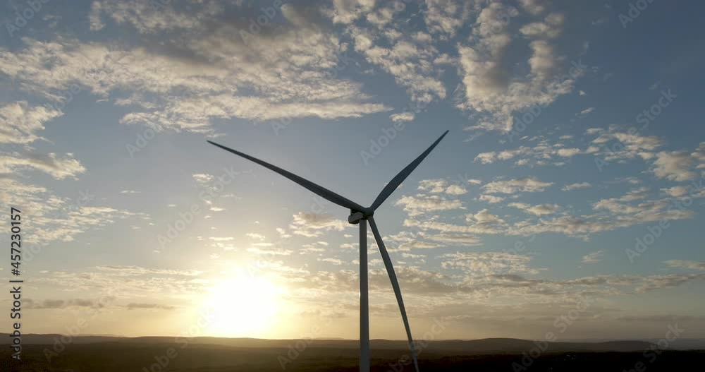 Wind turbine eco-farm on beautiful blue evening landscape. Renewable ...