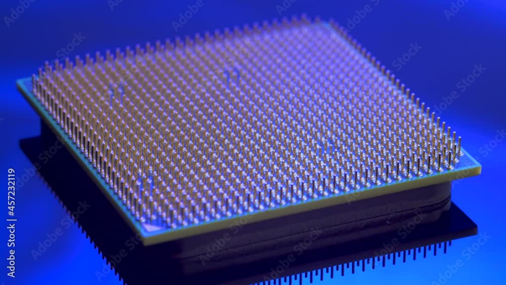 Sample of CPU processor at technology plant on blue mirror surface ...