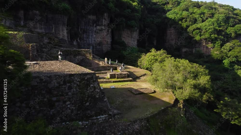 A troop of Mexican soldiers patrolling the old Aztec ruins located in ...