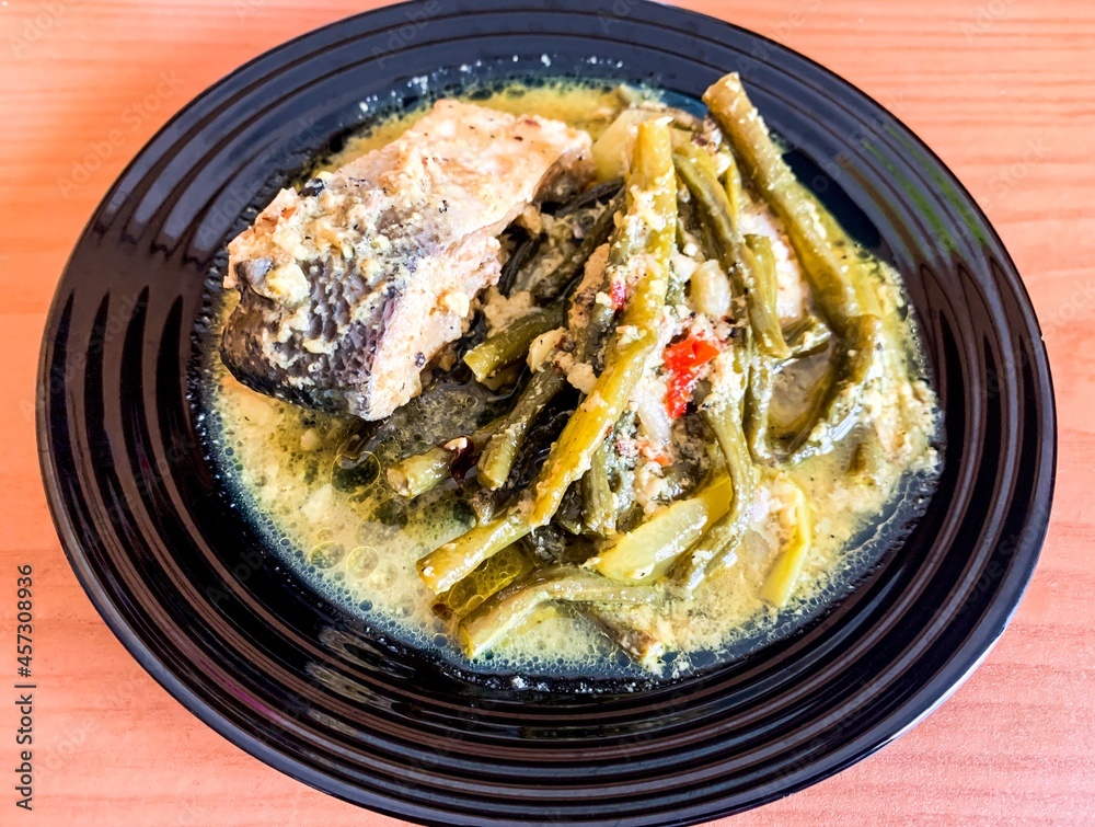 arsik is traditional food in batak ethnic indonesia. made from fish ...