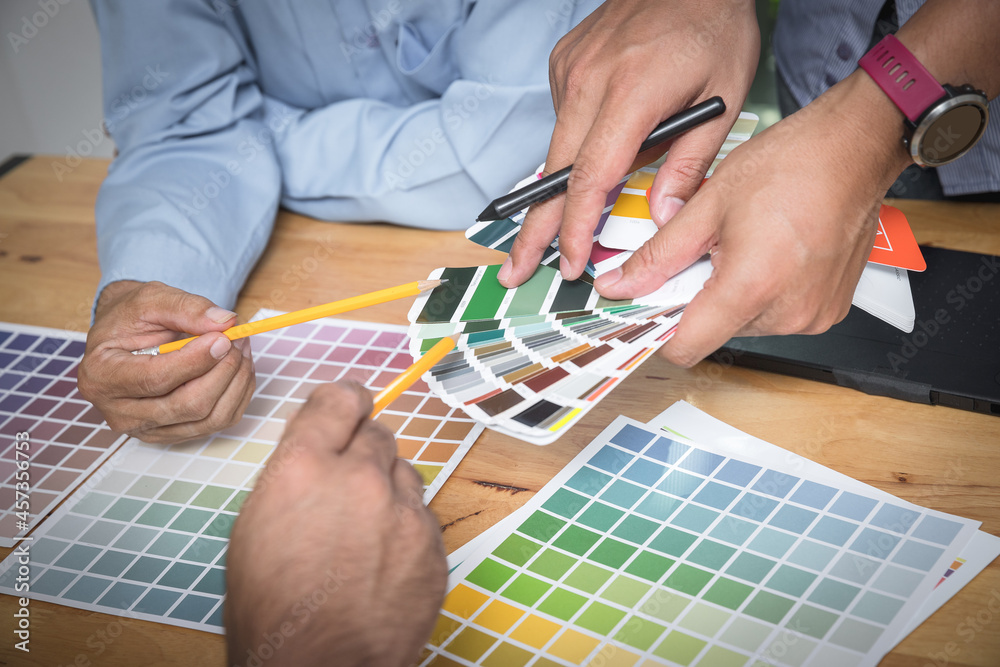 Interior designer chooses a color chart for home design. Graphic ...