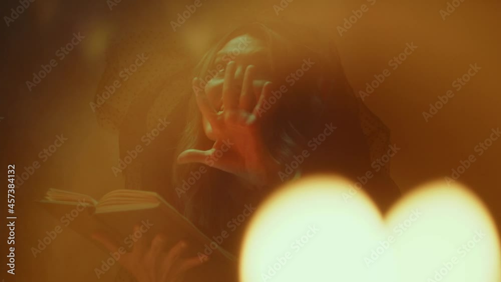 Witch woman reading spell, shouting. Evil sorceress making rite and ...