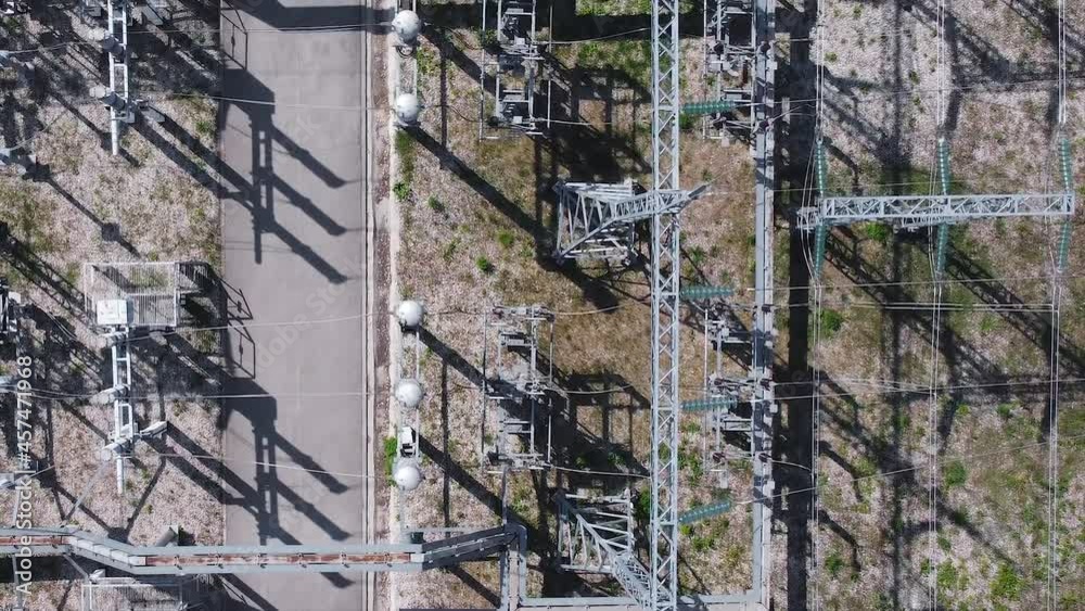 Aerial view of power plant, transformation station, cables and wires ...