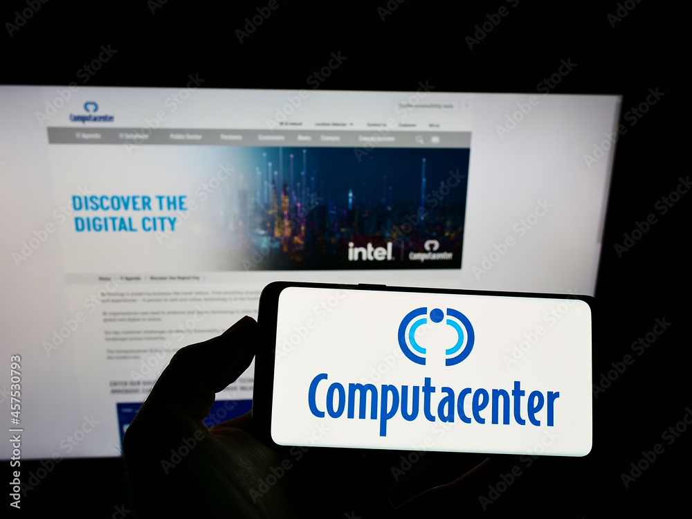 STUTTGART, GERMANY - Sep 12, 2021: Person holding cellphone with logo ...