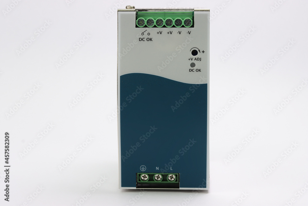 A power supply unit on a din rail for powering automation. Stock Photo ...