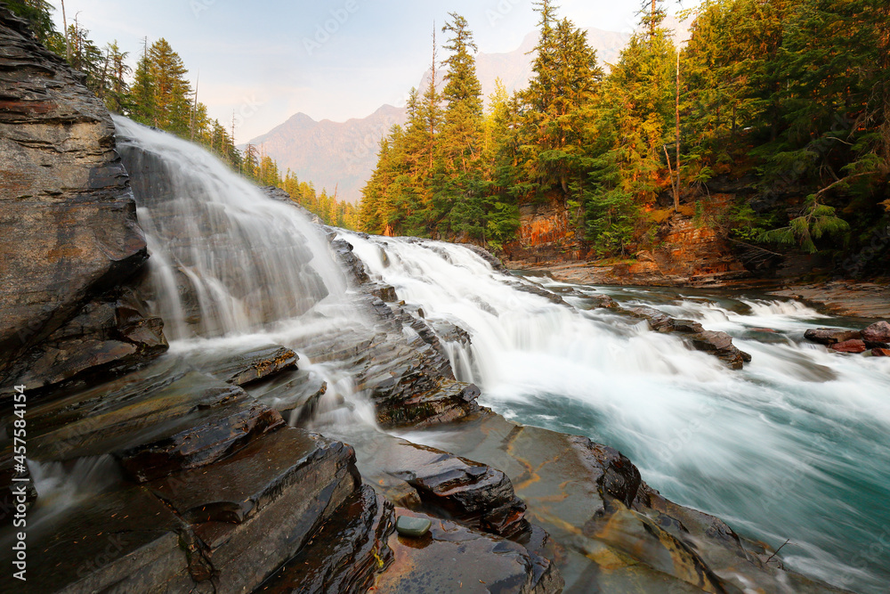 Sacred Dancing Cascade at sunset, Glacier National Park. Sacred Dancing ...