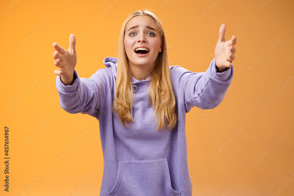 Excited fascinated glad blond woman adore singer performing stage ...