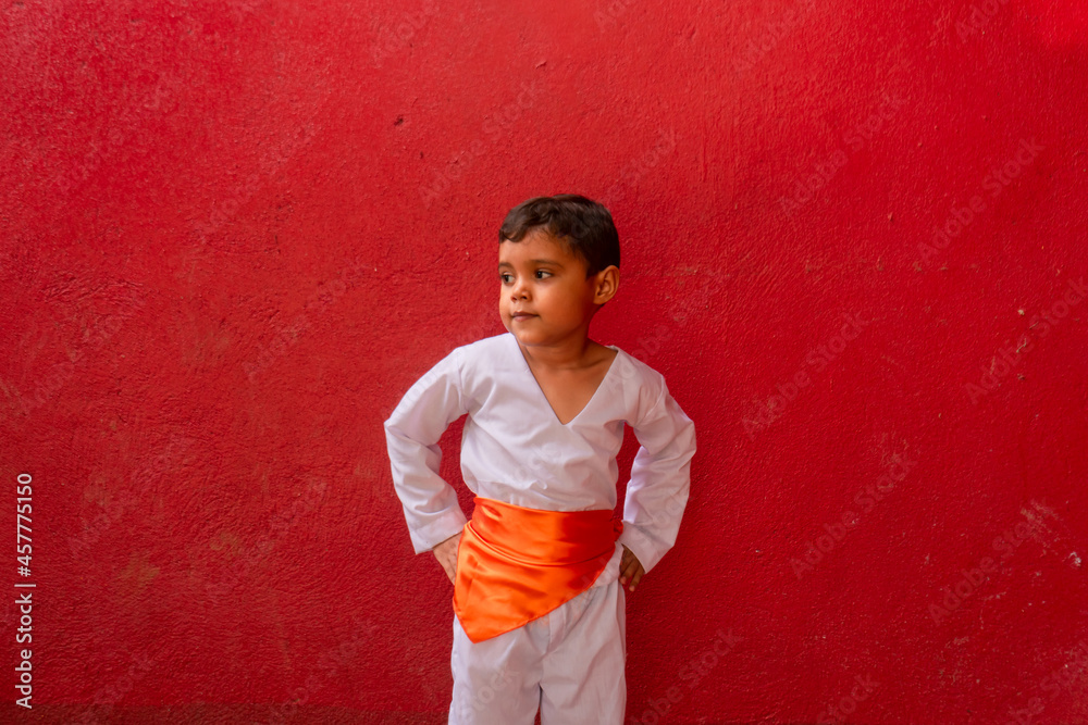 Hispanic boy smiling wearing traditional costume of latin america ...